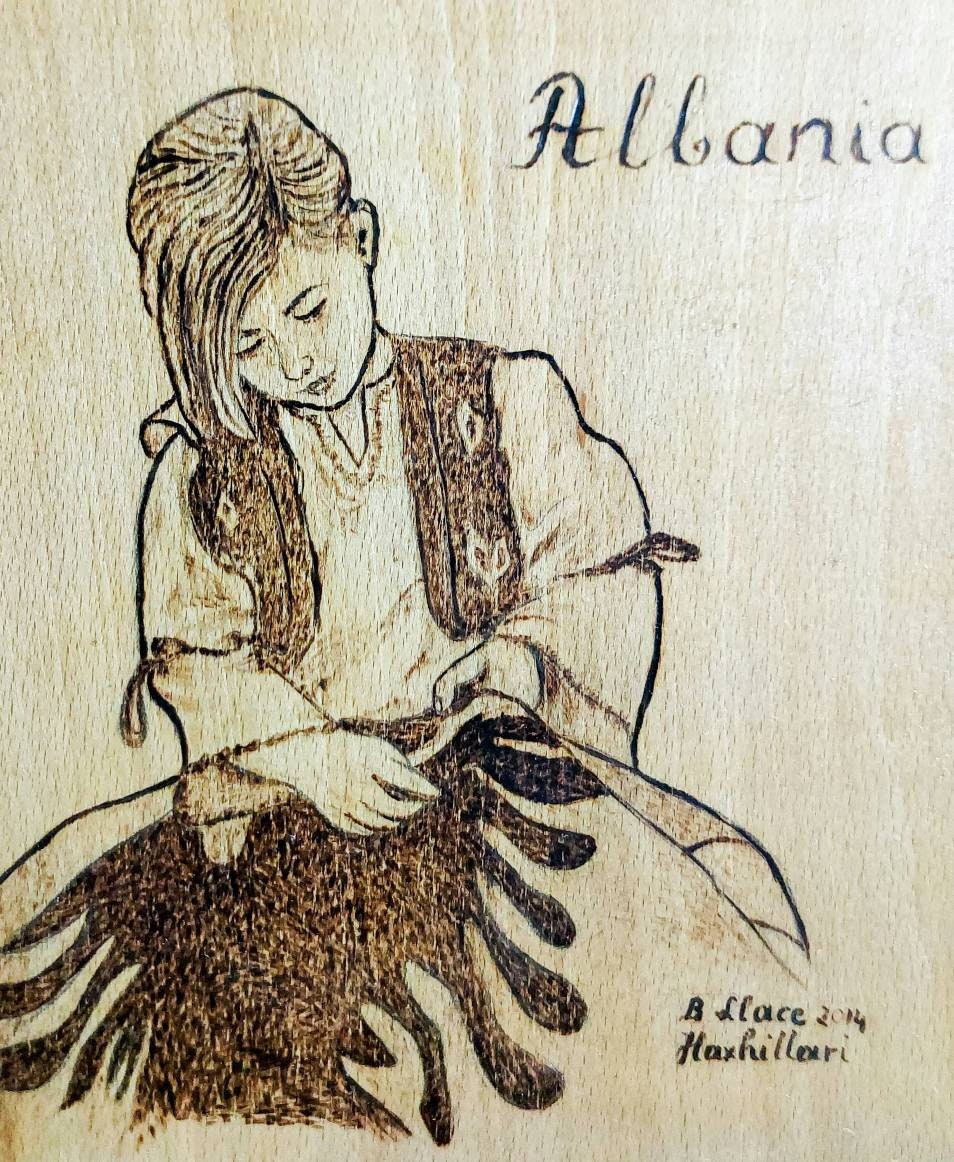 Albanian Art Girl Sewing the Albanian Flag. Wood Burning Traditional ...