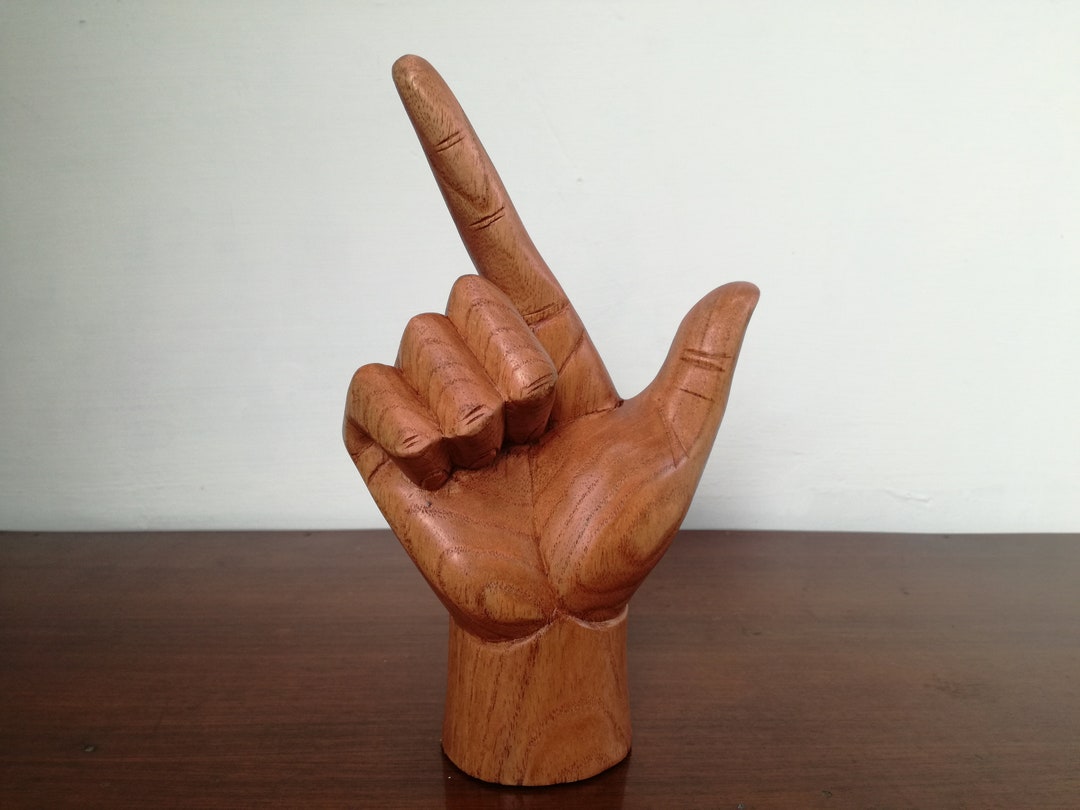 Wood Guns Hand Sign- the Guns up Sign - Guns Hand Sign - Texas Tech ...