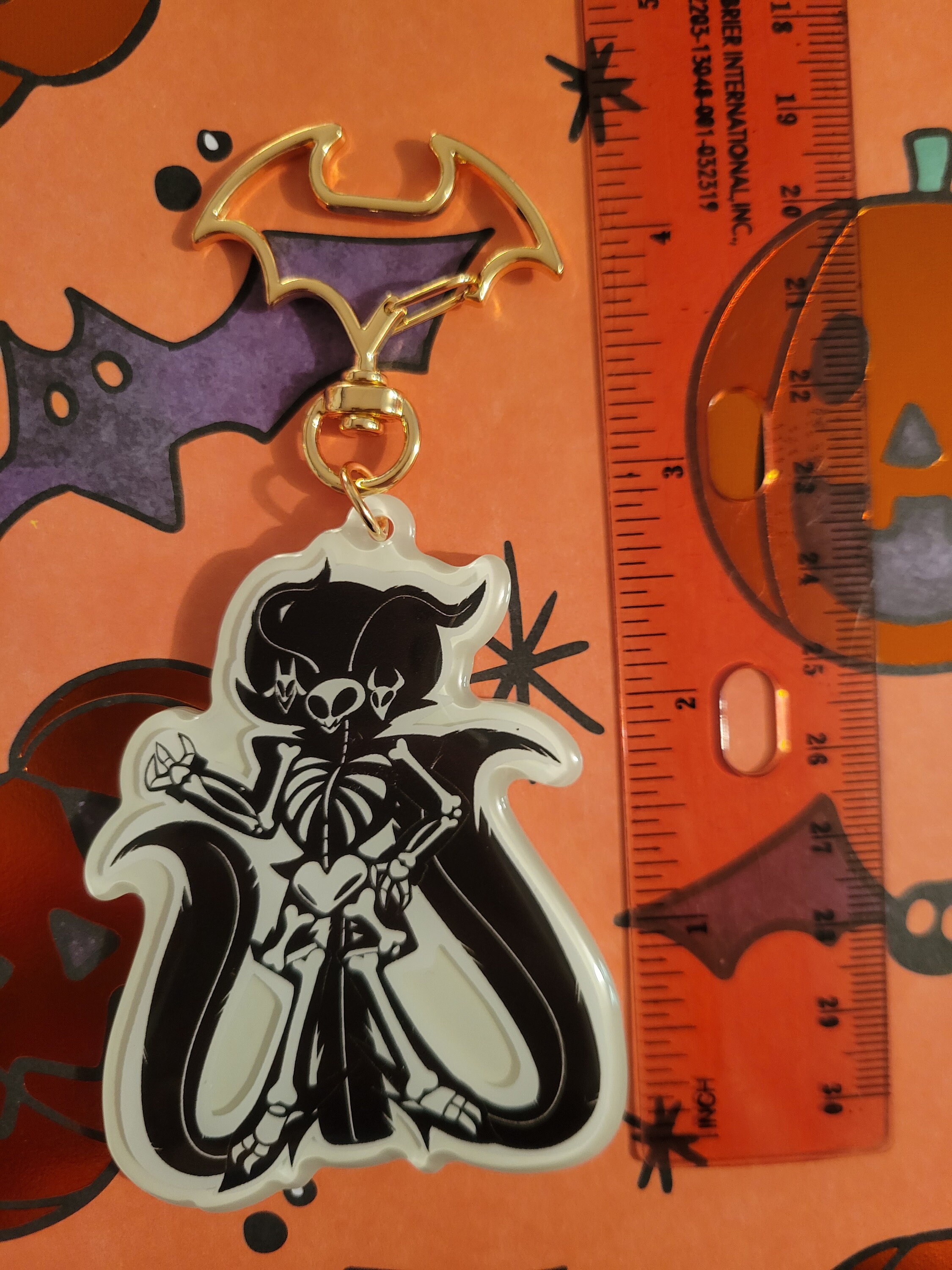 Fizzarolli and Asmodeus Glow in the Dark Skeleton Acrylic Keychains ...
