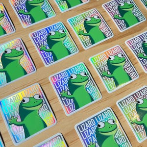 Tom the Lizard Holographic Hoppers Meme Funny Sticker - Etsy