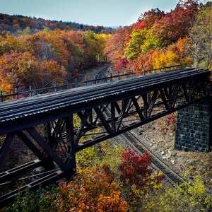 Abandoned Train Trestle in Vibrant Autumn Foliage - Captivating Wall ...