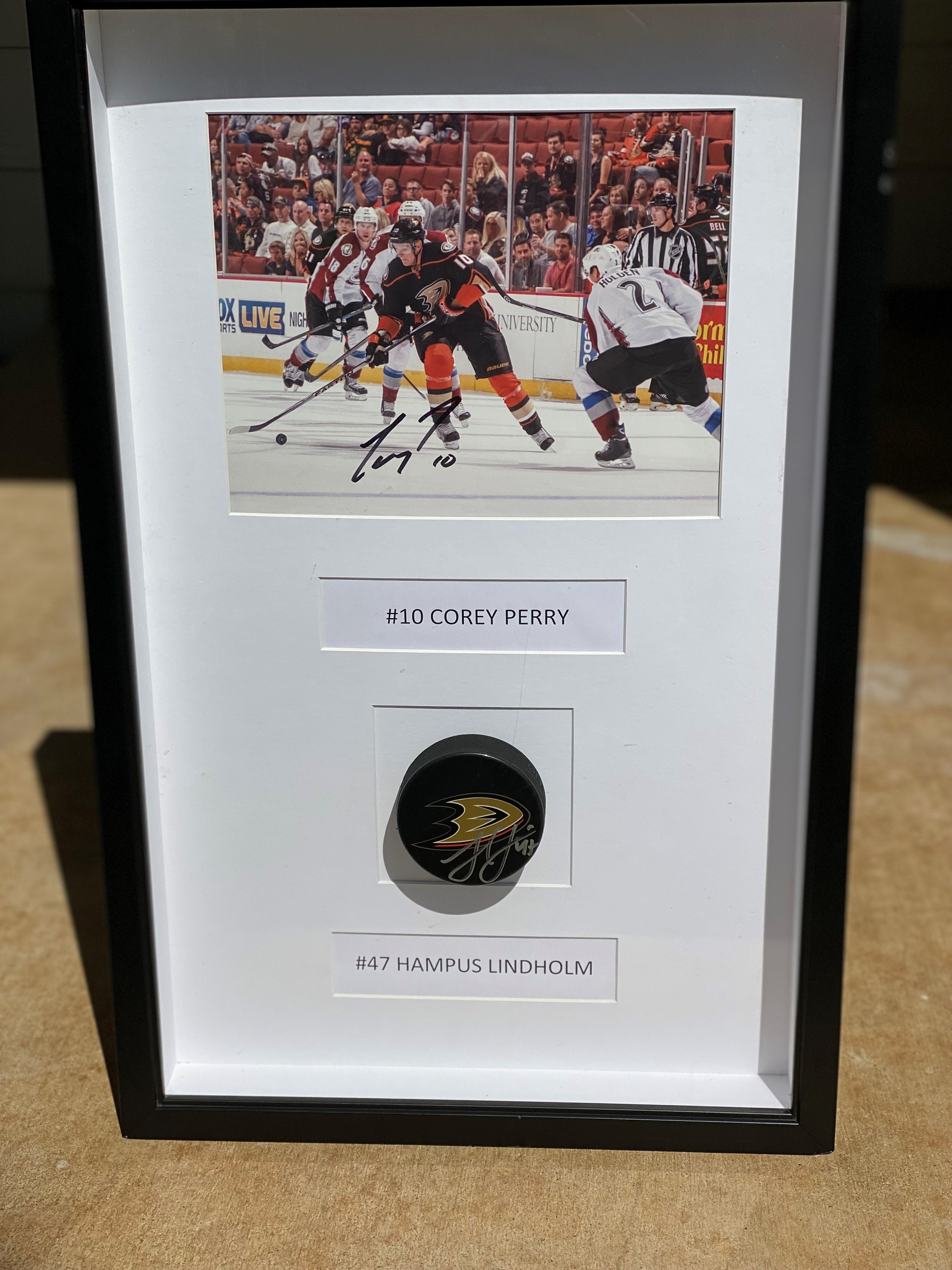 Corey Perry & Hampus Lindholm: Signed Photo, Signed Hockey Puck, Boston ...