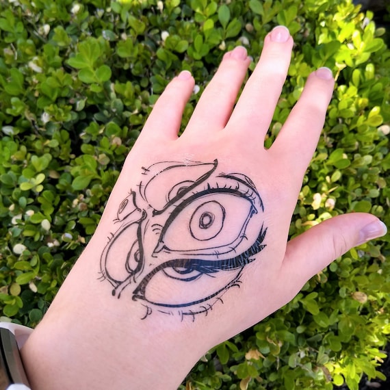Double Pupil Eye Tattoo