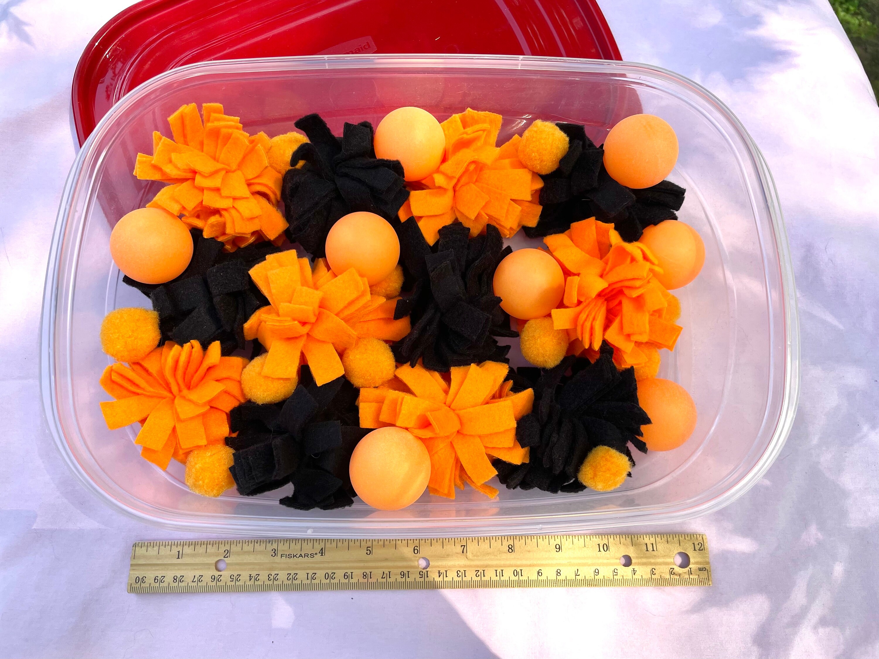 Orange and Black Halloween Hedgehog Dig Box Burrowing Fleece Pom Poms ...