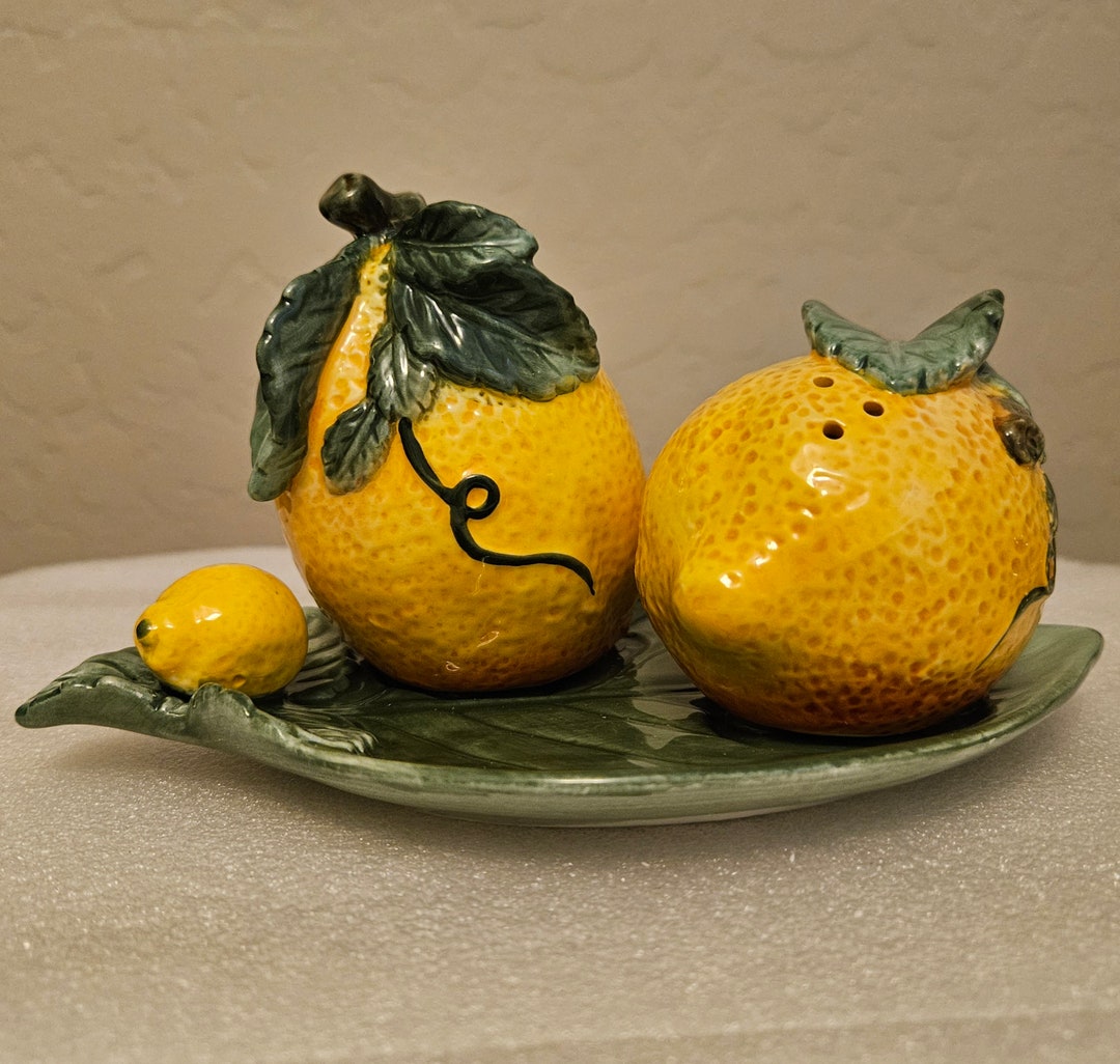 Corner Ruby Lemon Collection Salt and Pepper Shakers on a Plate Shaped ...