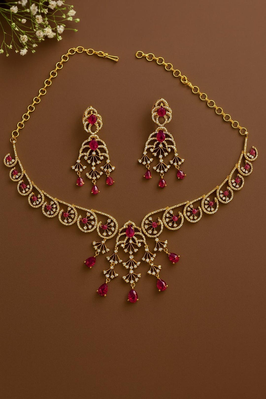 SASHA Ruby Red Cz Jewelry, Golden Mehndi Polish, Red Colour Sleek ...