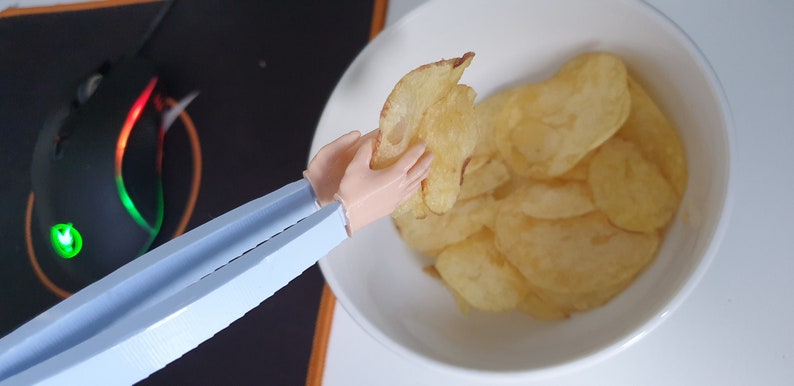 Finger Chopsticks Crisps Grabber. Gamers' Snacking Tongs. Clean Fingers ...