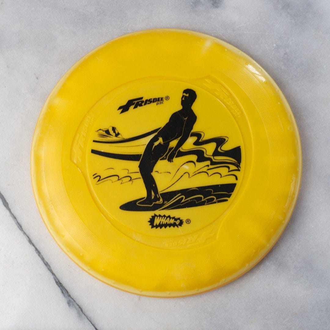 WHAM-O FRISBEE Toy Disc Yellow Orange Surfer Waves Beach 9" Plastic ...
