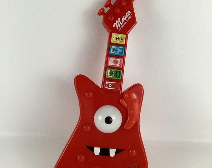 Yo Gabba Gabba Muno's Groovin' Guitar Musical Instrument Spin Master ...