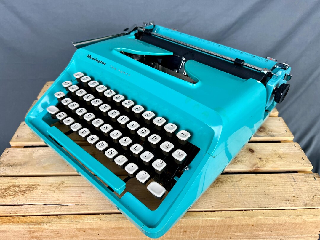1960's Cursive Typeface Turquoise Remington Ten Forty Portable ...
