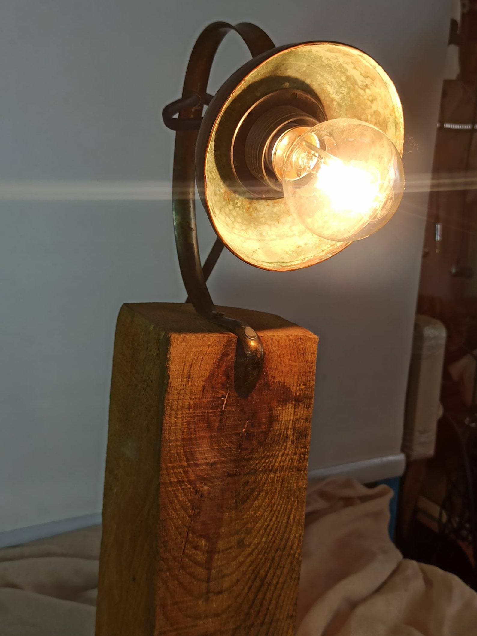 A Table Lamp or Work Lamp Made of Copper Material on Wood is a ...