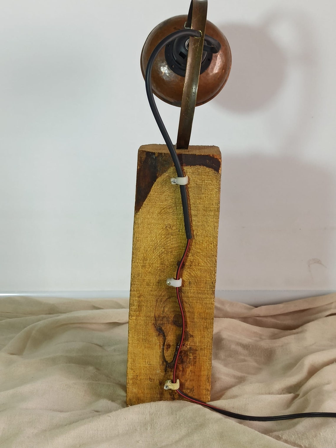 A Table Lamp or Work Lamp Made of Copper Material on Wood is a ...