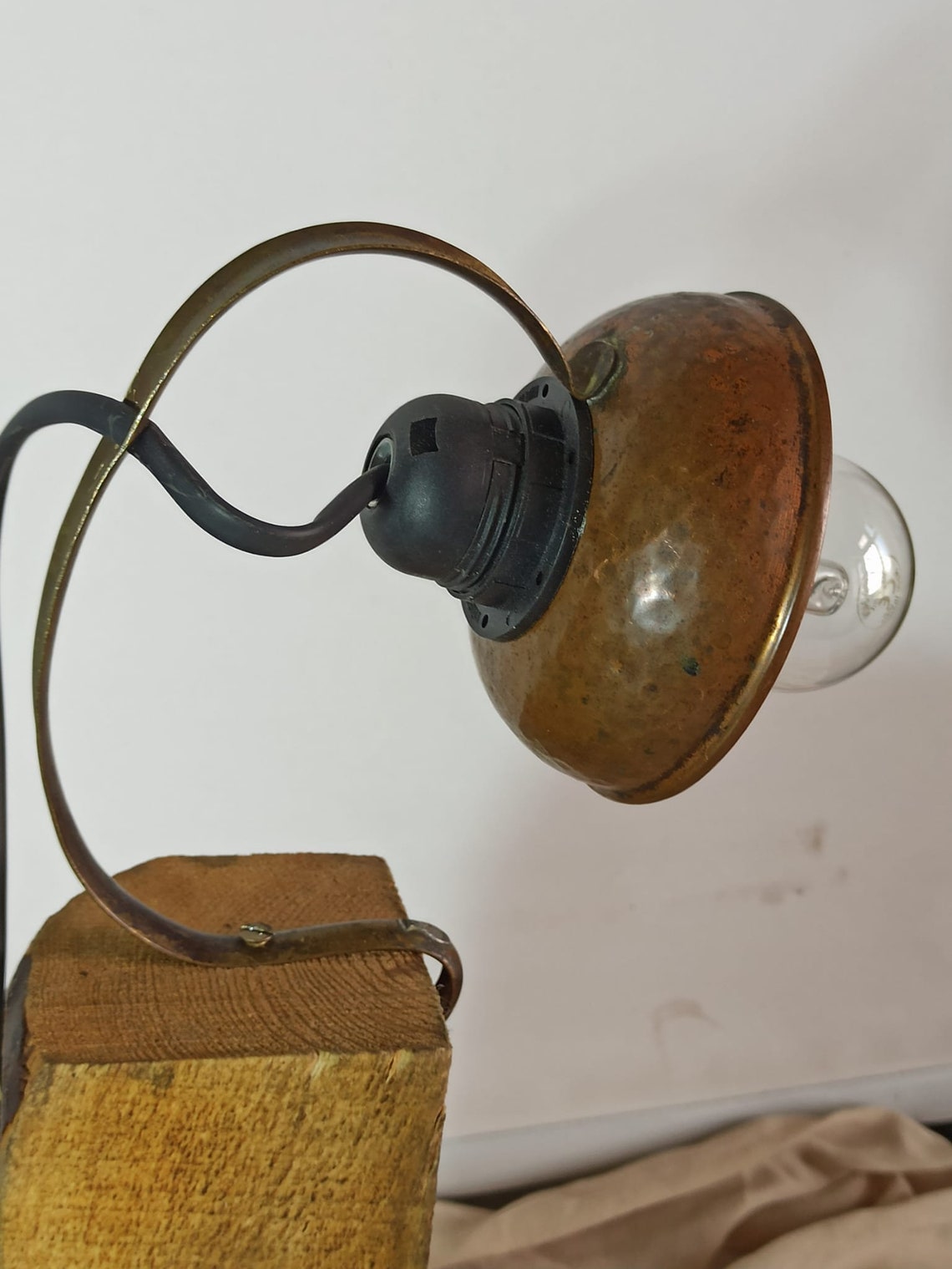 A Table Lamp or Work Lamp Made of Copper Material on Wood is a ...