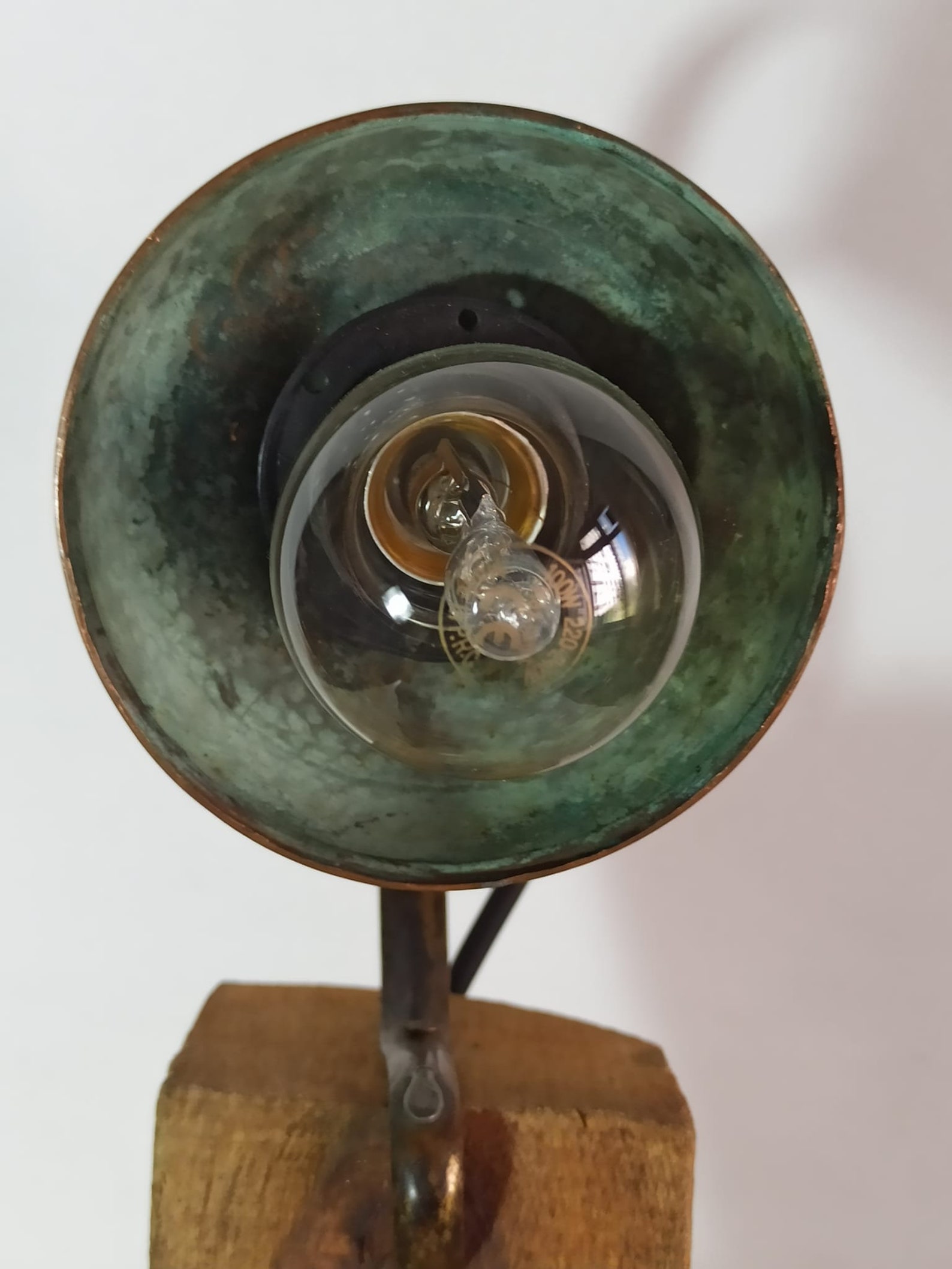 A Table Lamp or Work Lamp Made of Copper Material on Wood is a ...