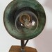 A Table Lamp or Work Lamp Made of Copper Material on Wood is a ...