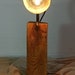 A Table Lamp or Work Lamp Made of Copper Material on Wood is a ...