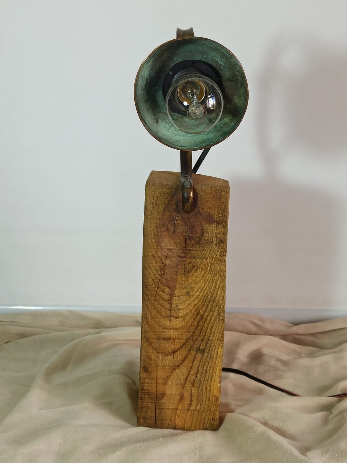 A Table Lamp or Work Lamp Made of Copper Material on Wood is a ...