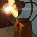 A Table Lamp or Work Lamp Made of Copper Material on Wood is a ...