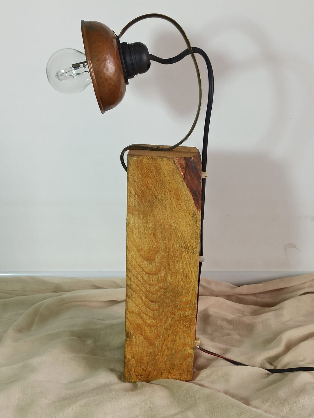 A Table Lamp or Work Lamp Made of Copper Material on Wood is a ...
