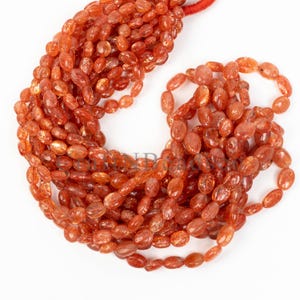 AAA +++ Natural Sun Stone Shaded Smooth Oval Shape Beads Strand ...