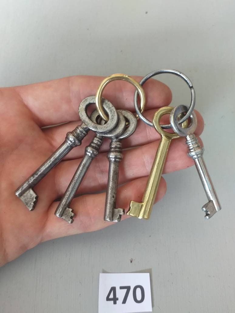 5 Vintage Keys 4 Vintage Steel Keys & 1 Vintage Brass Key on Old Brass ...