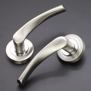 Pair of Twisted Lever on Sprung Rose Dual Tone Finish Door Pull Handles ...