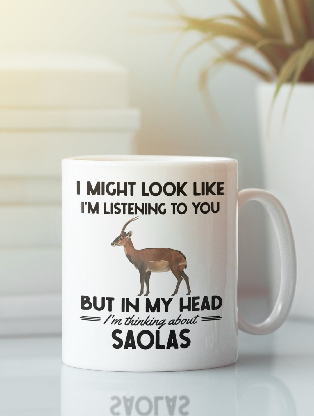 Saola Gifts, Saola Lover Mug, I Might Look Like I'm Listening to You ...