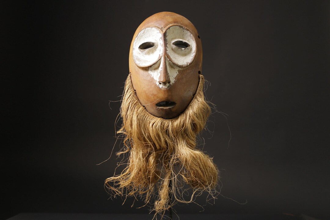 African Masks as Large African Masks Also Known as Hanging Lega Mask ...
