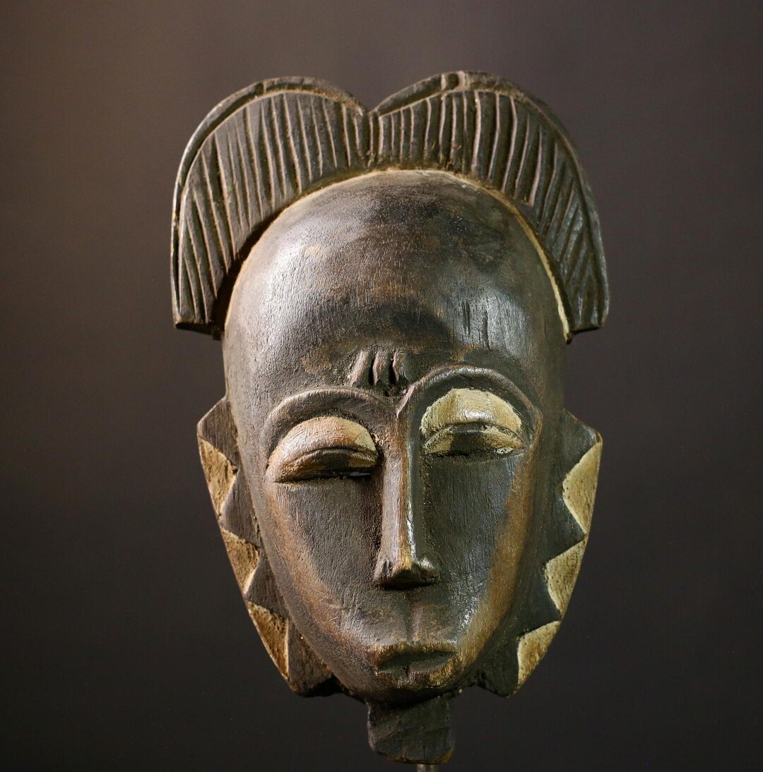African Yaure Tribal Mask With Carved Facial Lines and Domed Hairstyle ...