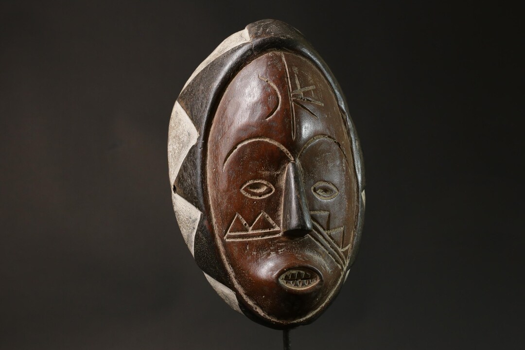 African Masks as Large African Masks Also Known as Hanging Lega Masks ...