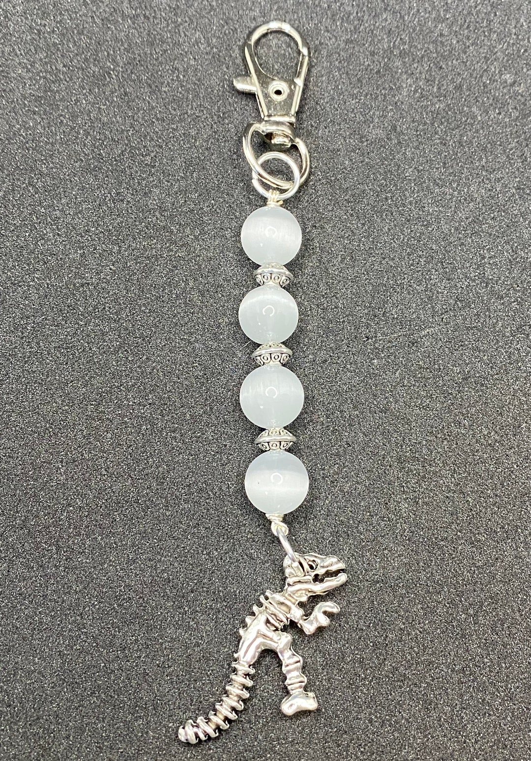 White Cat’s Eye and T-rex Skeleton Charm Beaded Gemstone Keychain - Etsy