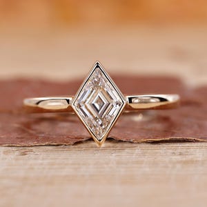 Solitaire Engagement Ring in Bezel Setting, 1 to 2 Ct Lozenge Cut Lab ...