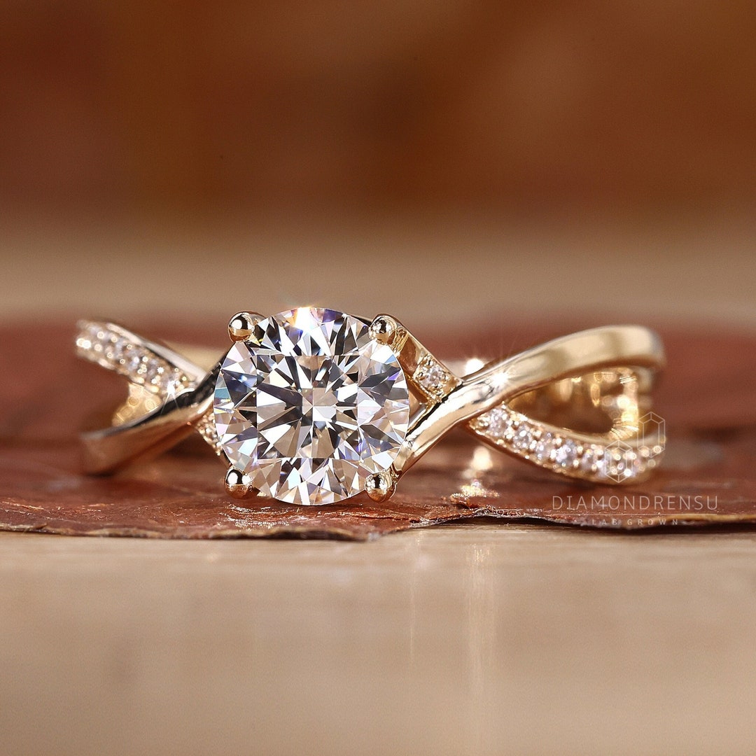 Round Diamond Twisted Engagement Ring With One Row Pave Stones ...