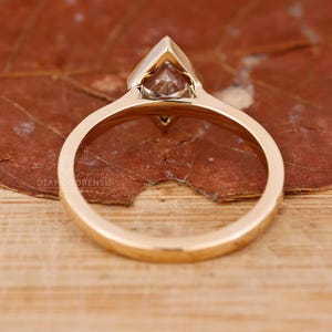 Solitaire Engagement Ring in Bezel Setting, 1 to 2 Ct Lozenge Cut Lab ...