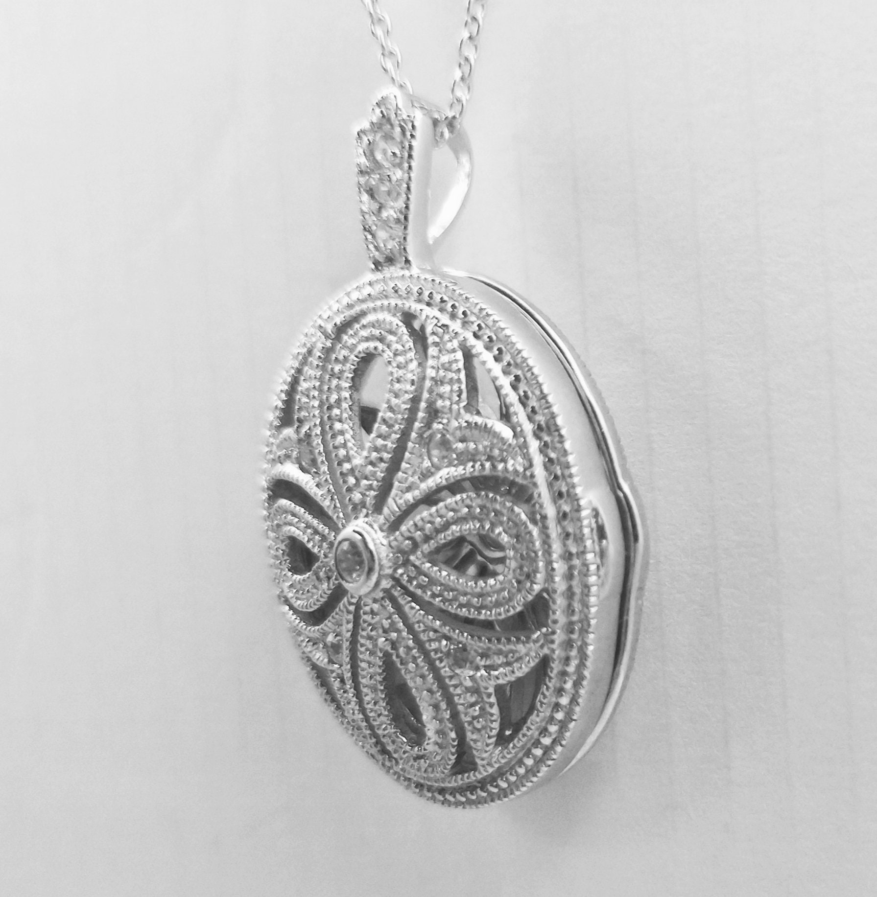 Glamourous Silver Oval CZ Locket the Locket Shop Rhodium Sterling ...