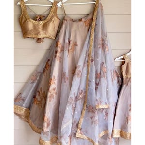 Grey Lining a Scintillating Grey, Copper and Gold Combination Lehenga ...