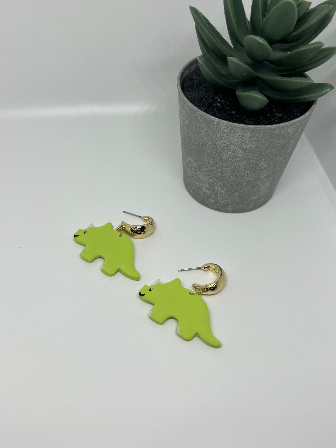 Lime Green Dinosaurs on a Gold Huggie Stud Earring | Polymer Clay ...