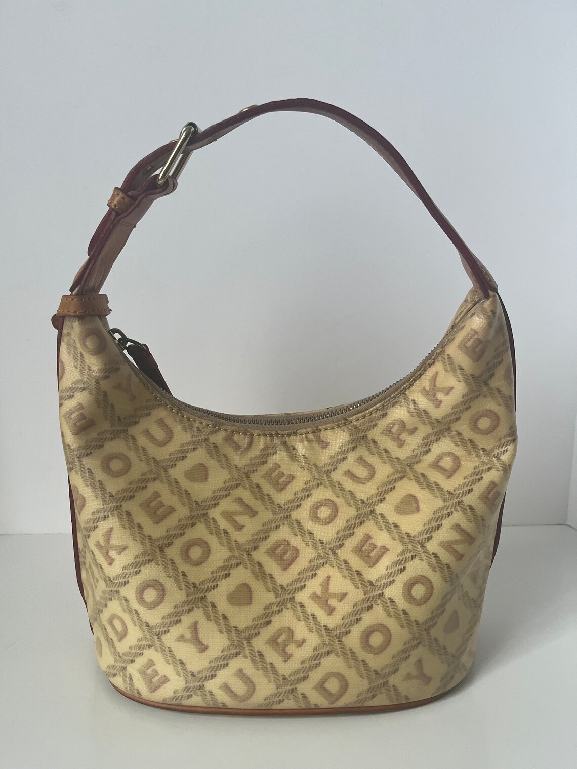 Dooney & Bourke Y2K “spellout” Small Bucket Bag - Etsy