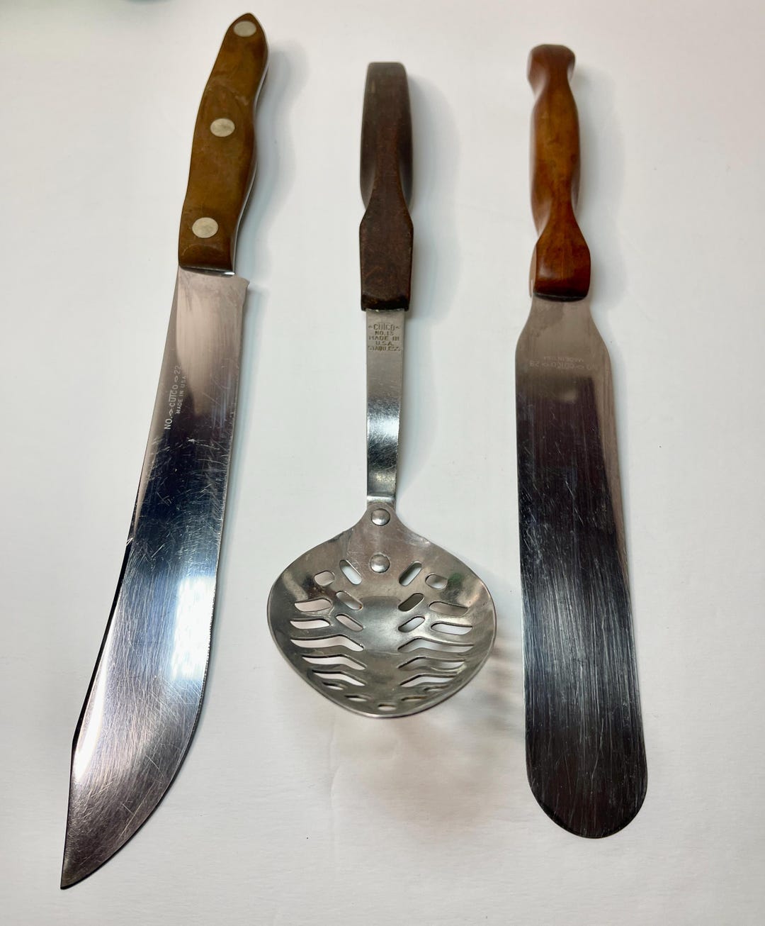 CUTCO Kitchen Tools. 13 Slotted Spoon, 22 Butcher, 28 Spreader. SOLD ...