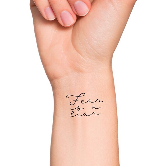 Love Script Tattoo On Finger