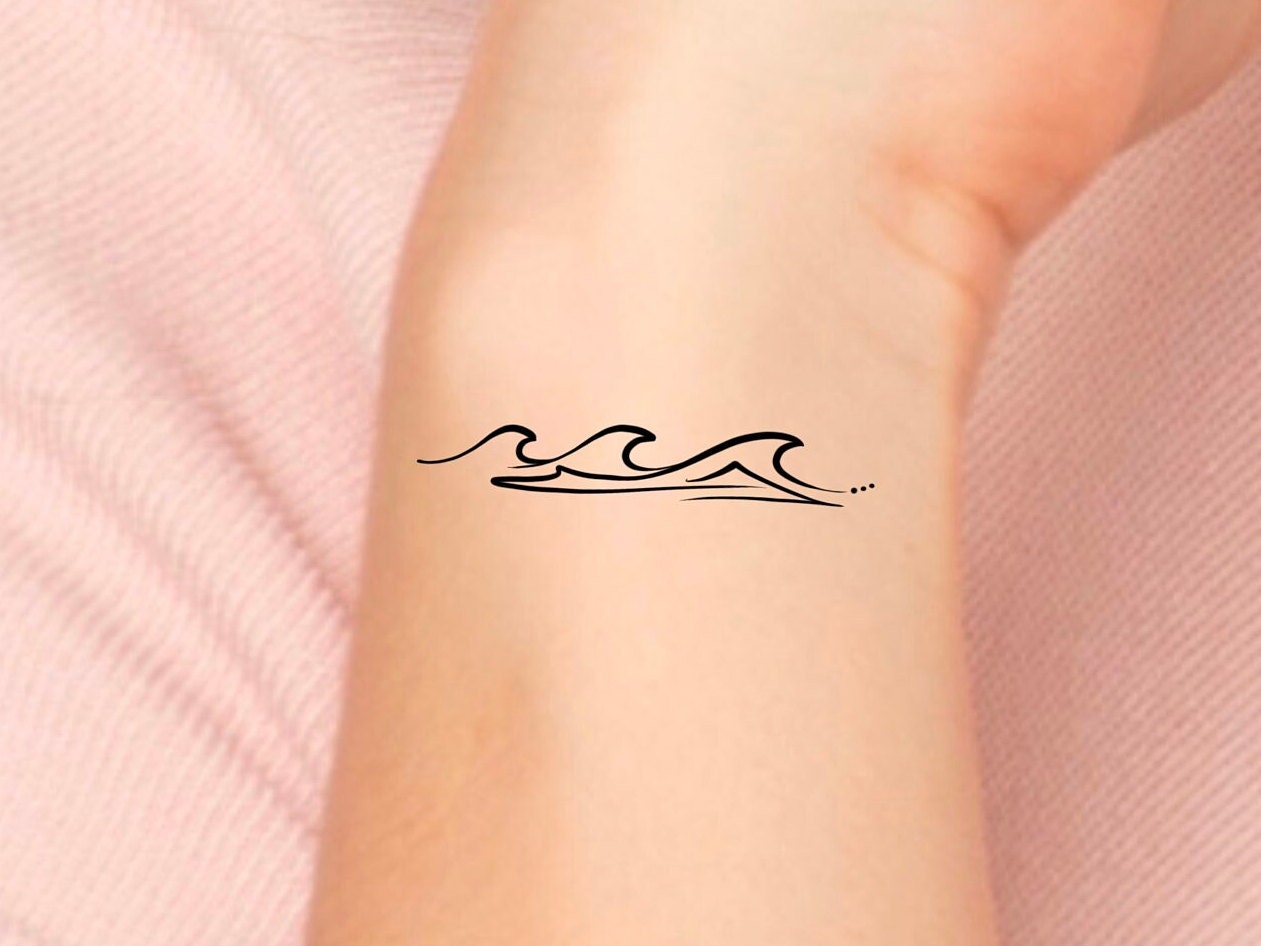 Simple Wave Tattoo On Ankle