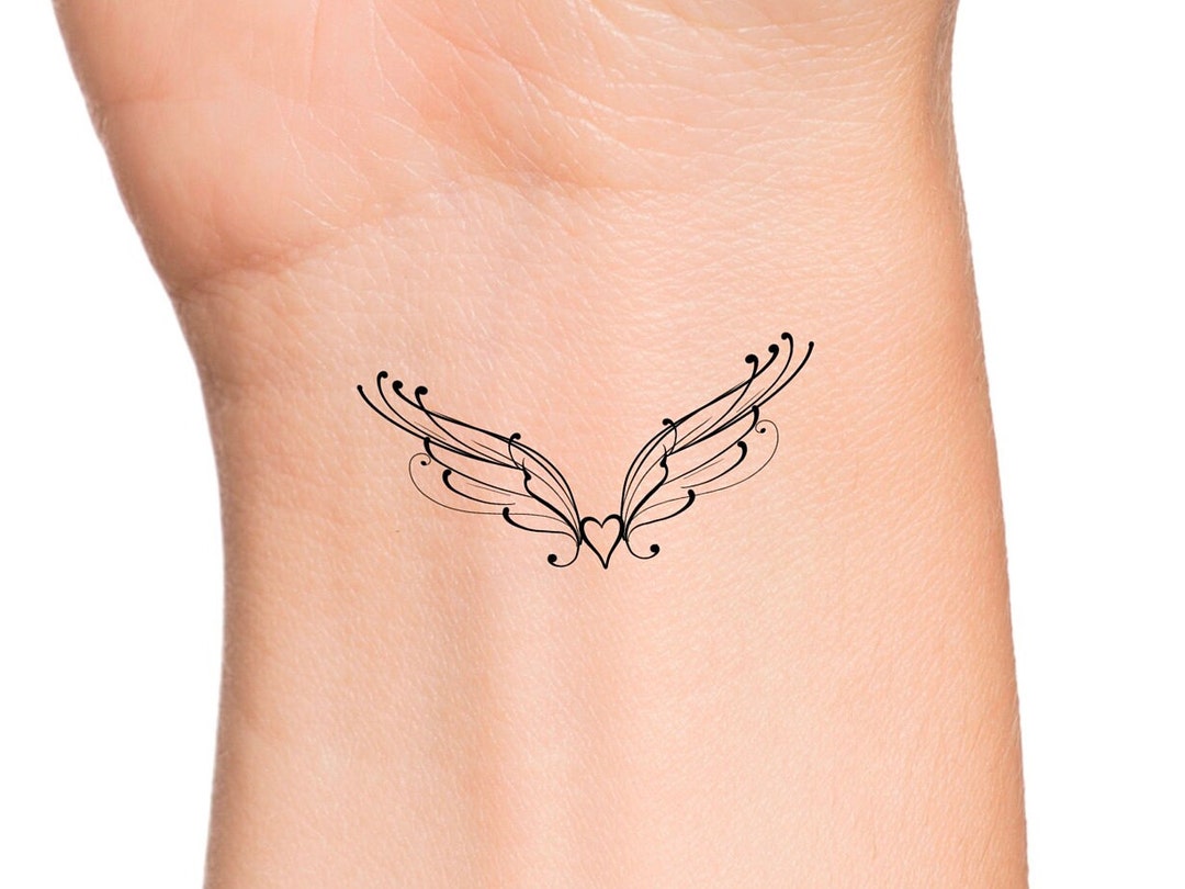 Wing Tattoo On Wrist