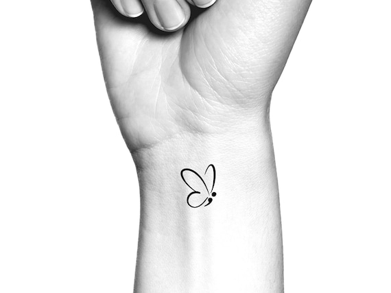Tatuaggio Farfalla Punto E Virgola