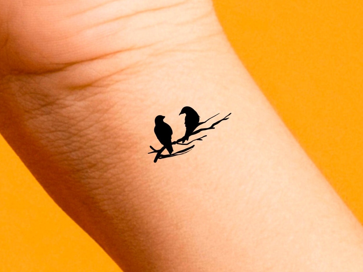 Two Birds On A Branch Tattoo