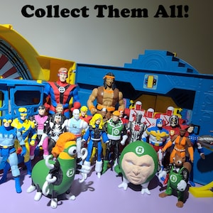 Batcave Trophy Room With Robin Memorial, Giant Penny, Penguin, and ...