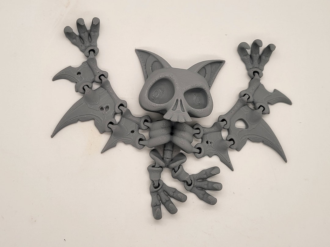 Flexi Bone Bat - Etsy