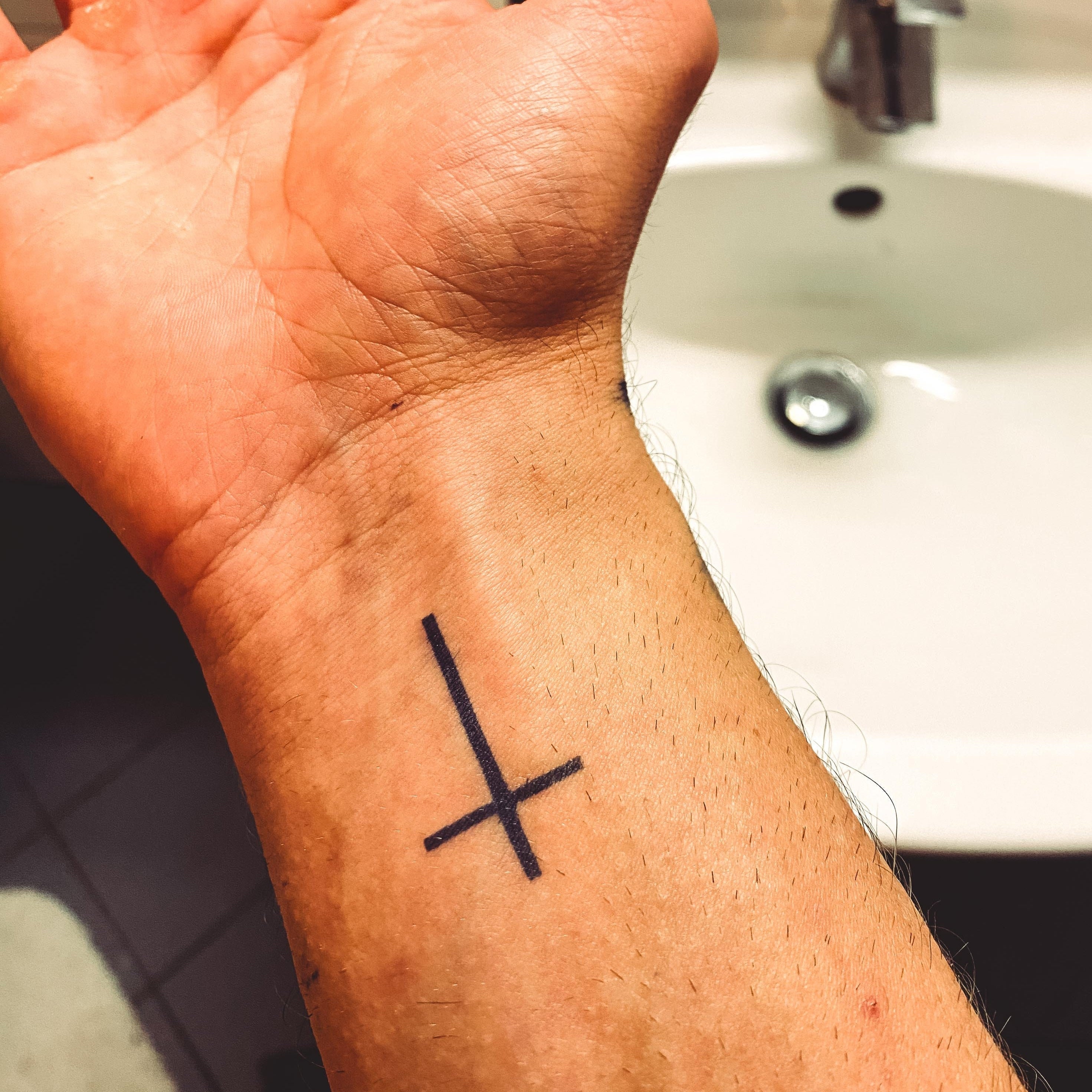 Split Cross Tattoos