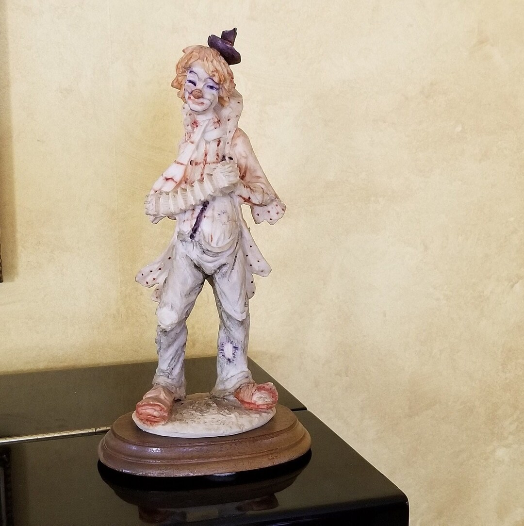 Vintage Pucci Clown Statue of Figure Holding A Human Spine Bone ...