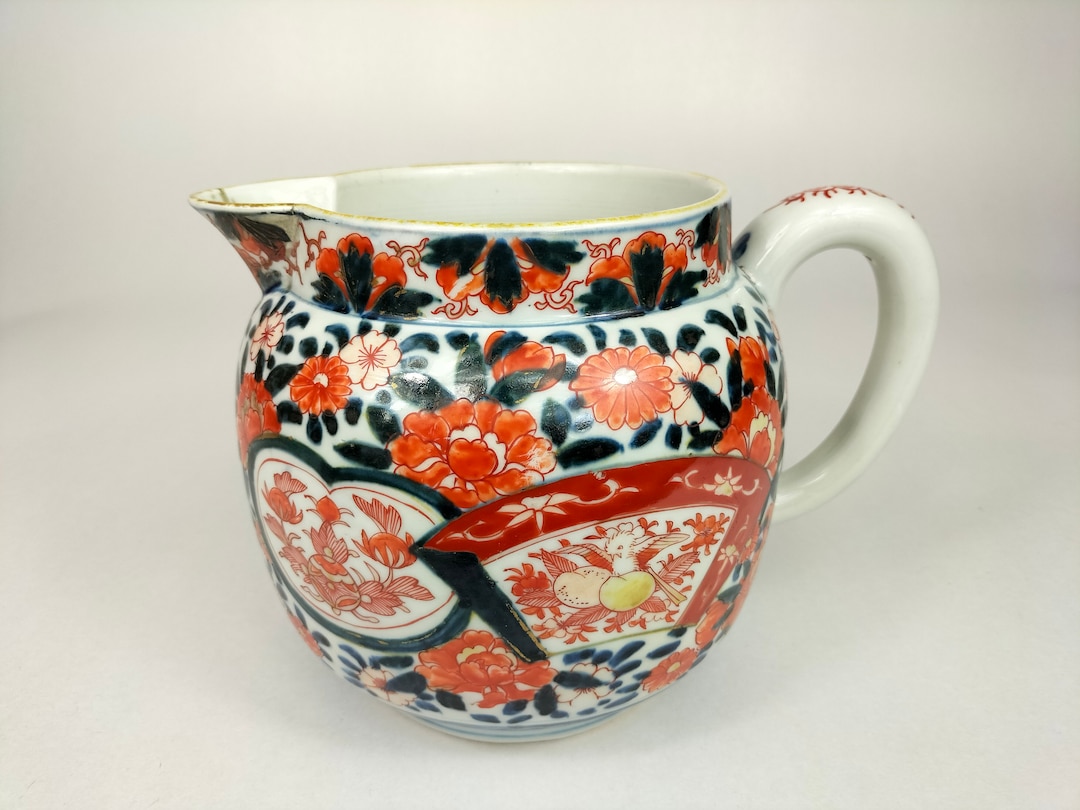Large Antique Japanese Imari Pitcher Decorated With Floral Motifs ...