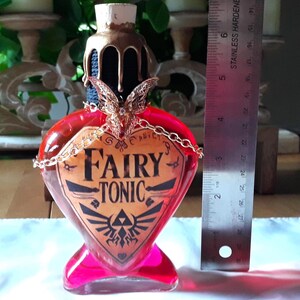 The Legend of Zelda FAIRY TONIC Potion Bottle With Magical Swirling ...